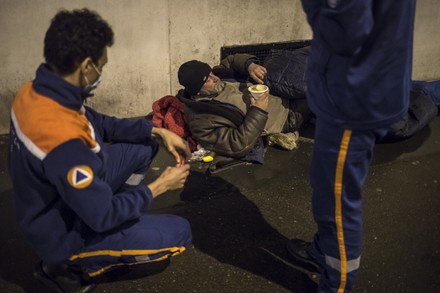 French Civil Protection volunteers conduct help assistance for homeless ...