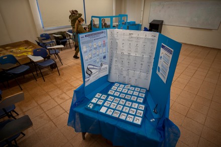 Israeli soldiers cast their votes in early elections at their base in ...