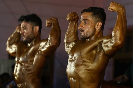 Bodybuilders Pose During Body Building Competition Editorial Stock ...