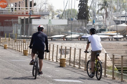 Two People Ride Bicycle On April Editorial Stock Photo - Stock Image ...