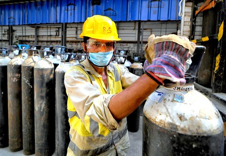 Worker Loading Unloading Oxygen Cylinders Government Editorial Stock ...