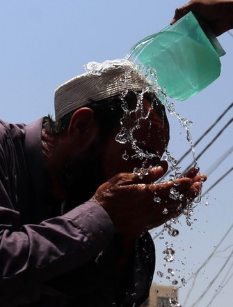 Heat wave in southern Pakistan, Karachi - 17 May 2021 Stock Pictures ...