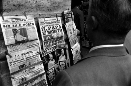 Man Looking Into Newspaper During Funeral Editorial Stock Photo - Stock ...