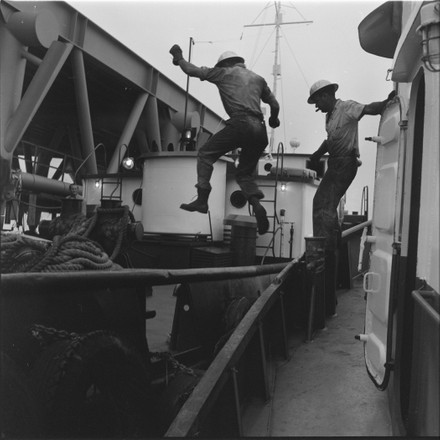 Workers Jumping Over Railings During Operation Editorial Stock Photo ...