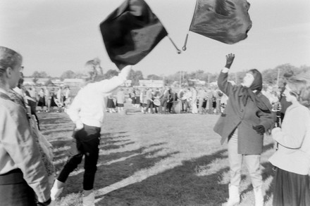 Two Women Throwing Flags During Event Editorial Stock Photo - Stock ...