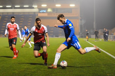 COLCHESTERS RYAN CLAMPIN CROSSES BALL INTO Editorial Stock Photo ...