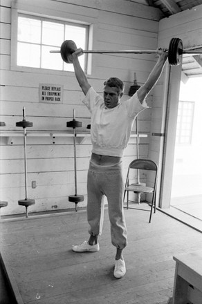 American Actor Steve Mcqueen Lifting Weight Editorial Stock Photo ...