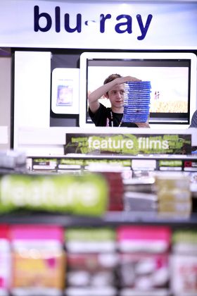Shop Assistant Stacks Bluray Discs Editorial Stock Photo - Stock Image ...