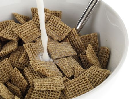 Pouring Milk Onto Shreddies Cereal Editorial Stock Photo - Stock Image ...