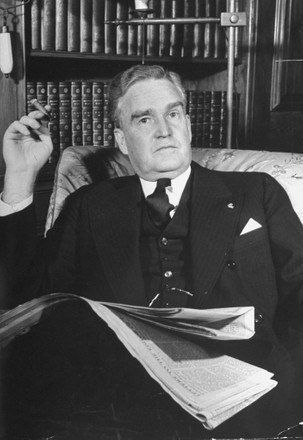 Bruce Barton Reading Newspaper During His Editorial Stock Photo - Stock Image | Shutterstock