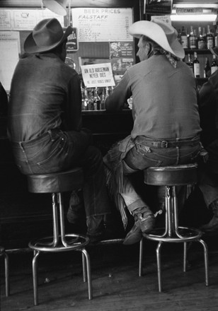 Two Cowboys Sitting Enjoying Drink Local Editorial Stock Photo - Stock ...