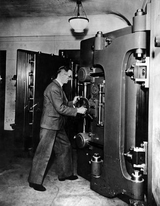 Man Opening Vault Door Editorial Stock Photo - Stock Image | Shutterstock