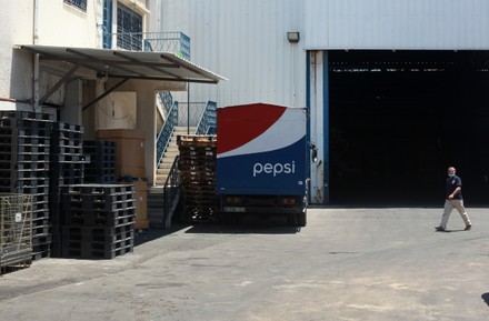Palestinian Worker Walks Past Gaza Pepsi Editorial Stock Photo - Stock ...
