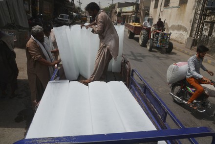 Pakistani Vendors Loading Ice Blocks Into Editorial Stock Photo - Stock ...