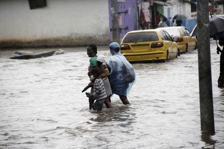 Vehicles Drive Through Flooded Street Monrovia Editorial Stock Photo ...