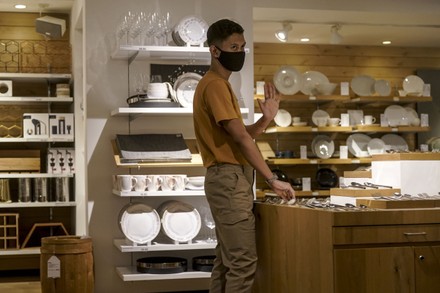 Sales Worker Gestures Inside Kitchenware Store Editorial Stock Photo ...
