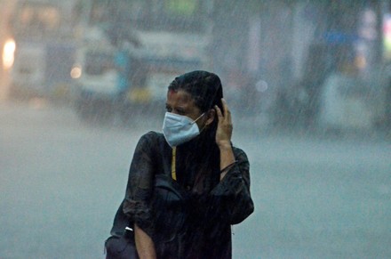 Woman Without Umbrella Walks During Heavy Editorial Stock Photo - Stock ...