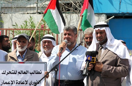 __COUNT__ Palestinian clans take part in a protest to demand the ...
