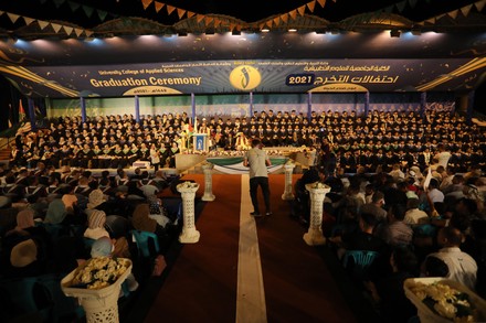 Palestinian students attend their graduation ceremony at University ...