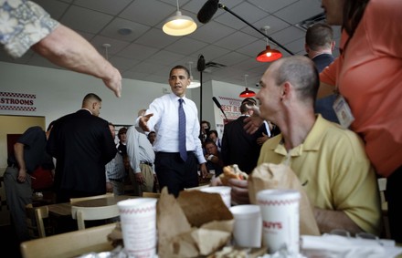 U.S. President Obama eats at Five Guys Burgers and Fries in Washington ...