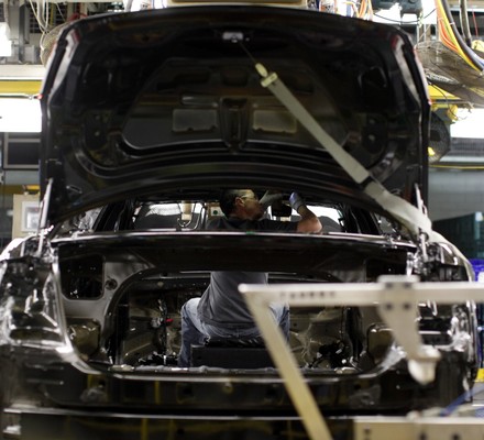 Worker Installs Parts On Car Ford Editorial Stock Photo - Stock Image ...