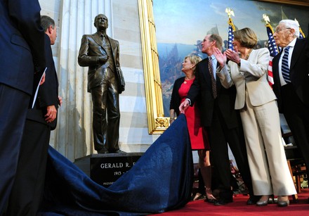 A statue of the late former President Gerald R. Ford is unveiled in ...