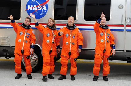 NASA's Space Shuttle "Atlantis" crew departs for the launch pad at the ...