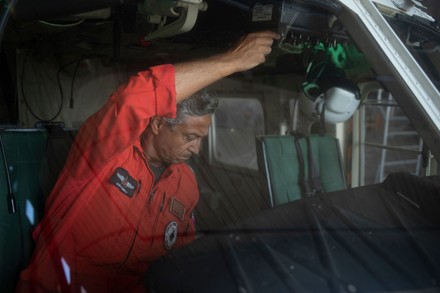 Onboard Firefighter Engineer Inspecting Ab412 Helicopter Editorial ...