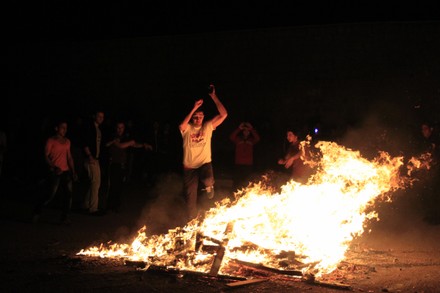 Iranian Man Jumps Over Bonfires During Editorial Stock Photo - Stock ...