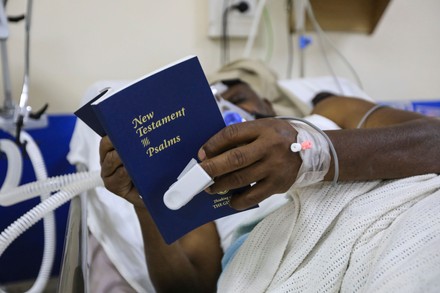 Covid19 Patient Reads Bible Inside Intensive Editorial Stock Photo ...