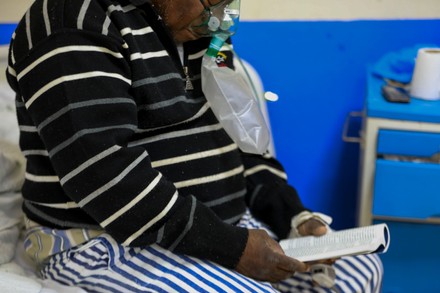 Covid19 Patient Holds Bible Inside Intensive Editorial Stock Photo ...