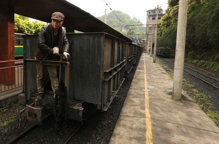 Chinese Rail Worker Rides On Coal Editorial Stock Photo - Stock Image ...