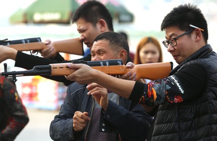 Chinese Men Shoot Toy Rifles Filled Editorial Stock Photo - Stock Image ...