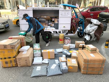Chinese Delivery Driver Sorts Packages Be Editorial Stock Photo - Stock ...