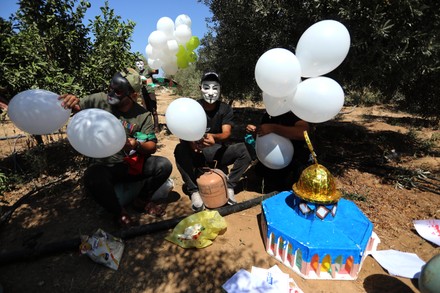 Masked Palestinians Prepare Incendiary Balloons Near Editorial Stock ...