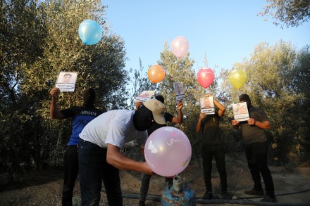 Masked Palestinians Prepare Balloons Photos Six Editorial Stock Photo ...