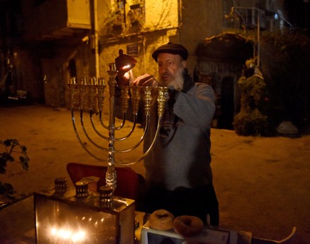 An Israeli Lights Candles On Hanukkah, Jerusalem, Israel - 25 Dec 2019 ...