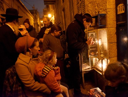 An Israeli Lights Candles On Hanukkah, Jerusalem, Israel - 25 Dec 2019 ...