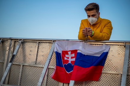FAITHFUL WEARING FACE MASK HOLDING ROSARY Editorial Stock Photo - Stock ...