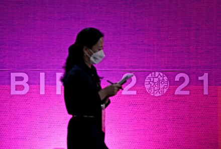 Woman Walks Past Biff Billboard During Editorial Stock Photo - Stock ...
