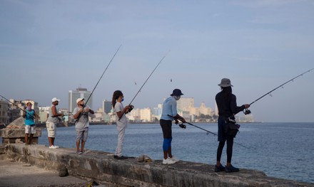 Several Men Fish On Malecon On Editorial Stock Photo - Stock Image ...