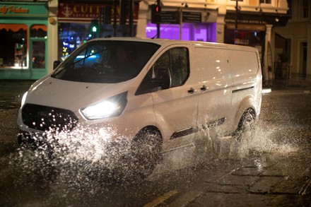 Van Drives Through Large Puddle During Editorial Stock Photo - Stock ...
