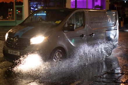 Van Drives Through Large Puddle During Editorial Stock Photo - Stock ...