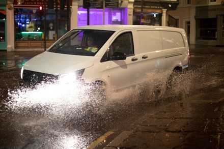 Van Drives Through Large Puddle During Editorial Stock Photo - Stock ...