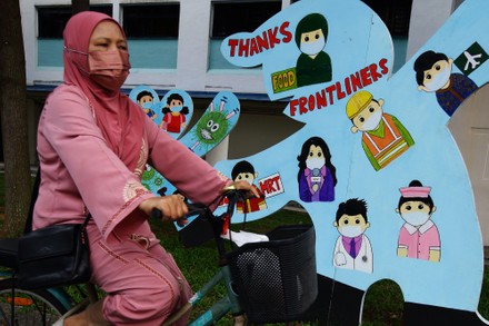Woman Wearing Protective Mask Cycles Past Editorial Stock Photo - Stock ...