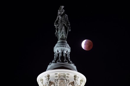 Partial Lunar Eclipse Occurring Behind Statue Editorial Stock Photo ...