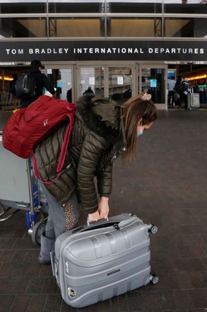 Traveler Picks Dropped Suitcase Before Entering Editorial Stock Photo ...