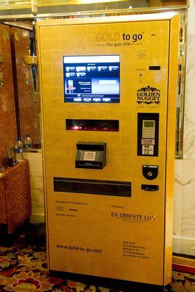 'Gold To Go' ATM, which dispenses gold in exchange for cash, at the ...