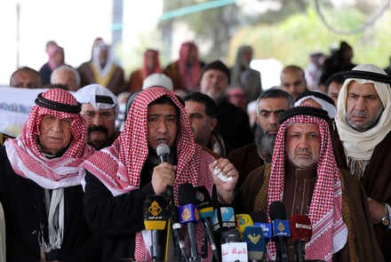 Palestinian clans take part in during a protest in solidarity with ...