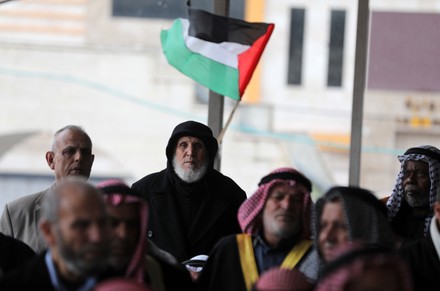 Palestinian clans take part in during a protest in solidarity with ...
